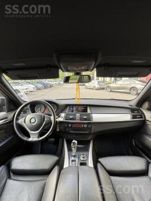 Black BMW X5 2011 in Riga, with an engine capacity of 3.00 L and mileage of 244 thousand km for 12999 €, photo 13 on AUTOMOTO.COM.LV