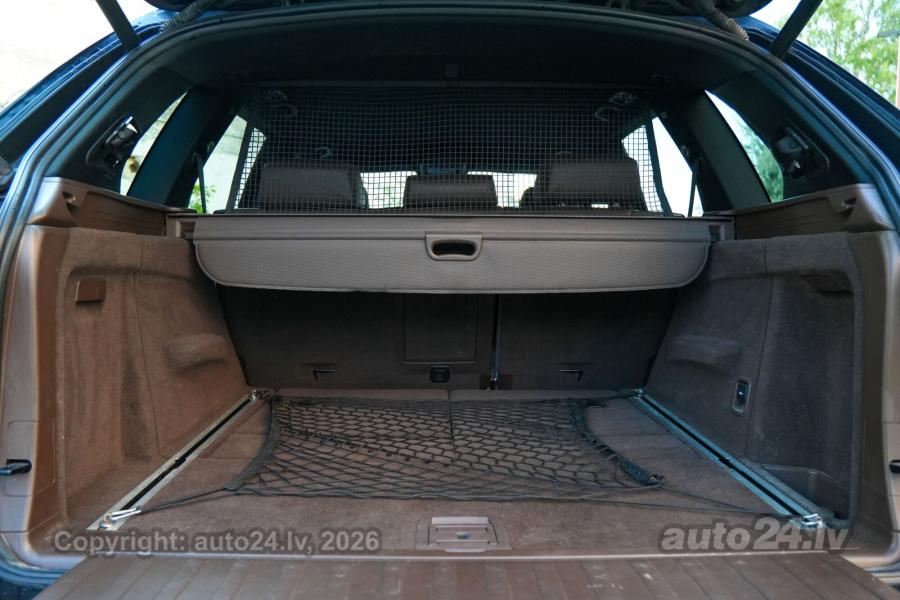Black BMW X5 2011 in Tallinn, with an engine capacity of 3.00 L and mileage of 270 thousand km for 15299 €, photo 18 on AUTOMOTO.COM.LV