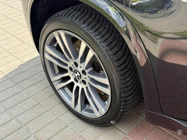 Black BMW X5 2011 in Marijampole, with an engine capacity of 2.99 L and mileage of 267 thousand km for 12750 €, photo 11 on AUTOMOTO.COM.LV