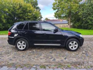 Black BMW X5 2011 in Jelgava, with an engine capacity of 3.00 L and mileage of 0 thousand km for 8900 €, photo 8 on AUTOMOTO.COM.LV