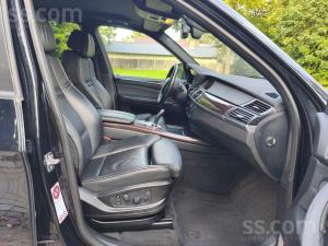 Black BMW X5 2011 in Jelgava, with an engine capacity of 3.00 L and mileage of 0 thousand km for 8900 €, photo 14 on AUTOMOTO.COM.LV