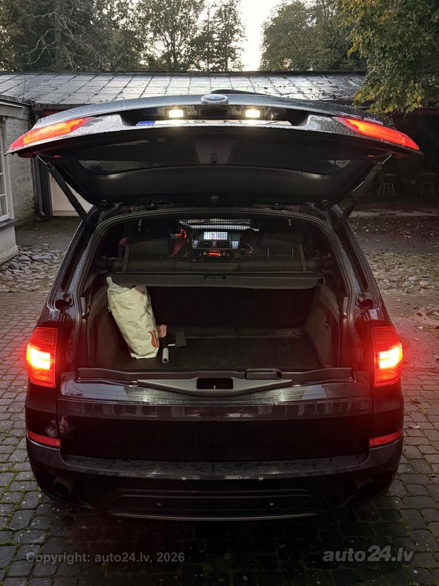 Black BMW X5 2011 in Tallinn, with an engine capacity of 3.00 L and mileage of 395 thousand km for 11000 €, photo 7 on AUTOMOTO.COM.LV