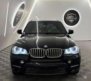 Black BMW X5 2012 in Marijampole, with an engine capacity of 2.99 L and mileage of 298 thousand km for 11750 €, photo 21 on AUTOMOTO.COM.LV
