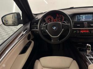 Black BMW X5 2012 in Marijampole, with an engine capacity of 2.99 L and mileage of 298 thousand km for 11750 €, photo 32 on AUTOMOTO.COM.LV