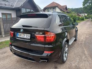 Black BMW X5 2012 in Riga, with an engine capacity of 3.00 L and mileage of 0 thousand km for 12100 €, photo 4 on AUTOMOTO.COM.LV