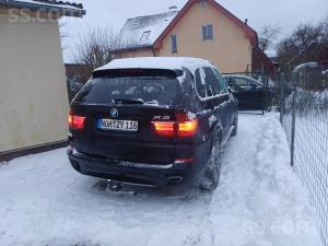 Black BMW X5 2012 in Riga, with an engine capacity of 3.00 L and mileage of 0 thousand km for 12100 €, photo 30 on AUTOMOTO.COM.LV