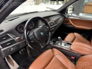 Black BMW X5 2012 in Riga, with an engine capacity of 3.00 L and mileage of 280 thousand km for 12990 €, photo 14 on AUTOMOTO.COM.LV