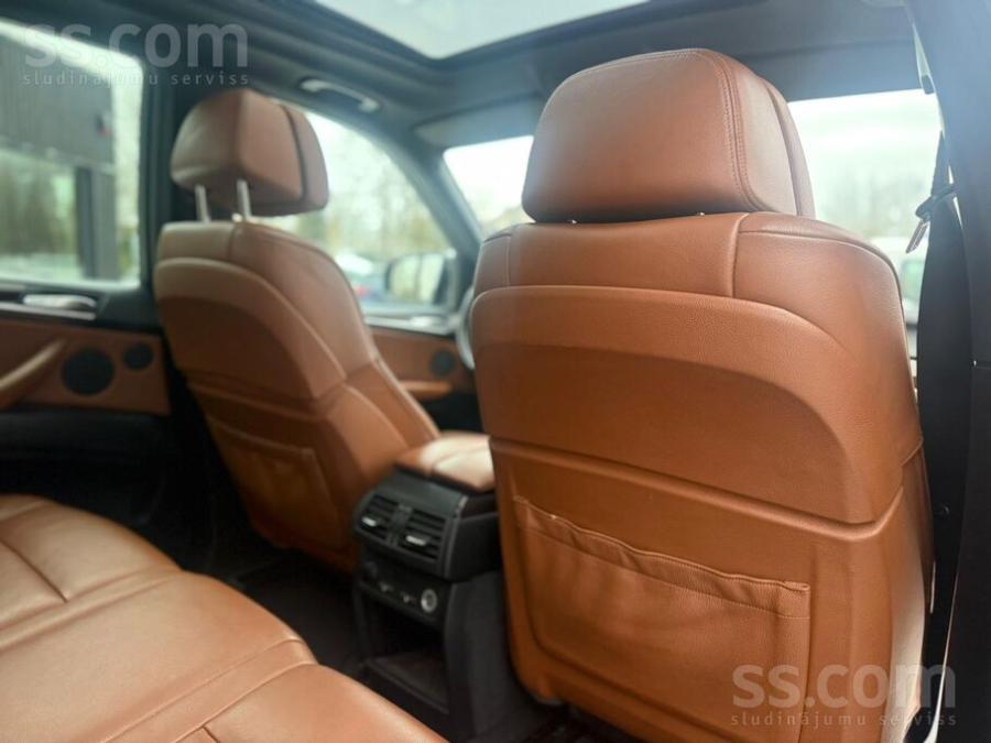 Black BMW X5 2012 in Riga, with an engine capacity of 3.00 L and mileage of 280 thousand km for 12990 €, photo 26 on AUTOMOTO.COM.LV