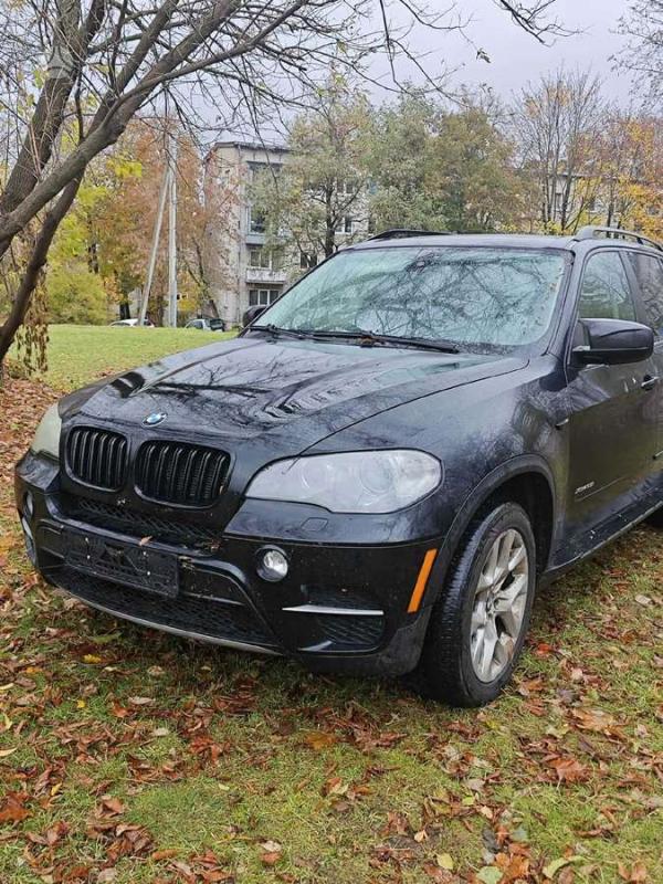 Black BMW X5 2012 in Vilnius, with an engine capacity of 2.99 L and mileage of 166 thousand km for 6990 €, photo 3 on AUTOMOTO.COM.LV