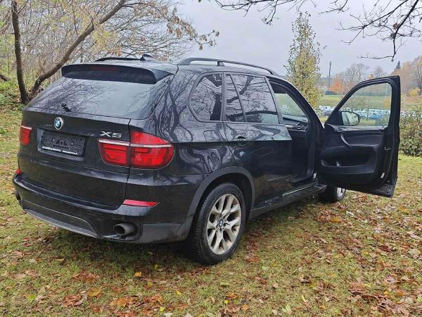 Black BMW X5 2012 in Vilnius, with an engine capacity of 2.99 L and mileage of 166 thousand km for 6990 €, photo 6 on AUTOMOTO.COM.LV