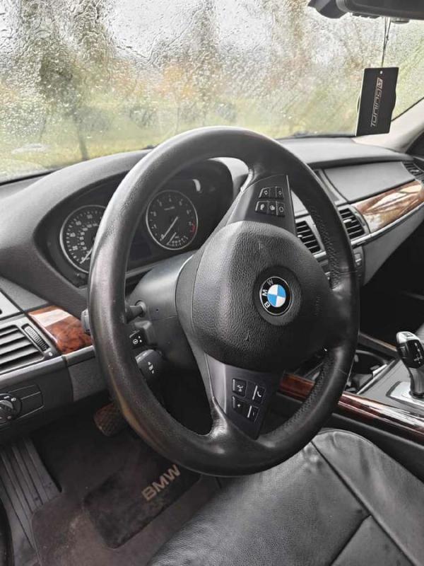 Black BMW X5 2012 in Vilnius, with an engine capacity of 2.99 L and mileage of 166 thousand km for 6990 €, photo 7 on AUTOMOTO.COM.LV