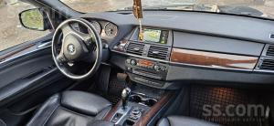 Black BMW X5 2012 in Cesis, with an engine capacity of 3.00 L and mileage of 264 thousand km for 13300 €, photo 10 on AUTOMOTO.COM.LV