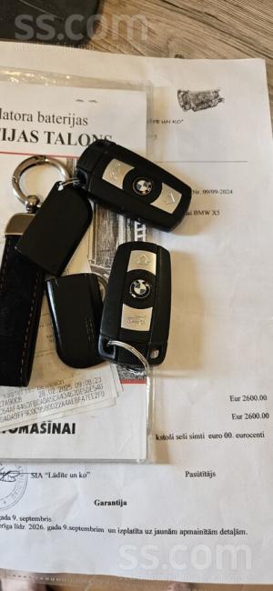 Black BMW X5 2012 in Cesis, with an engine capacity of 3.00 L and mileage of 264 thousand km for 13300 €, photo 27 on AUTOMOTO.COM.LV