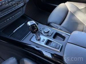 Black BMW X5 2012 in Tukums, with an engine capacity of 3.00 L and mileage of 204 thousand km for 13600 €, photo 12 on AUTOMOTO.COM.LV