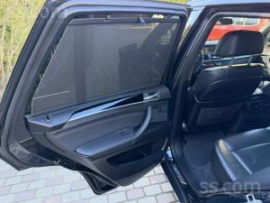 Black BMW X5 2012 in Tukums, with an engine capacity of 3.00 L and mileage of 204 thousand km for 13600 €, photo 14 on AUTOMOTO.COM.LV
