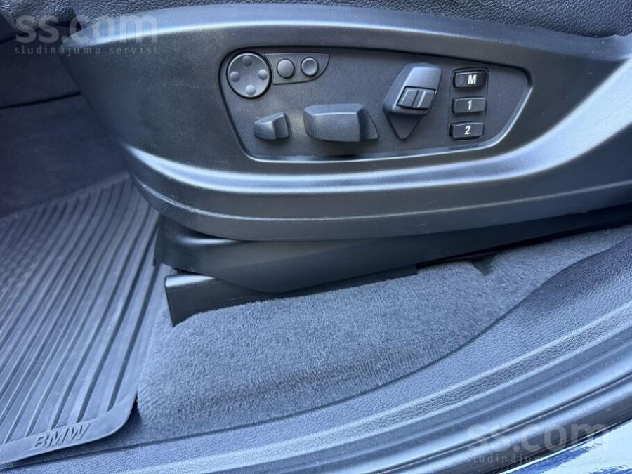Black BMW X5 2012 in Tukums, with an engine capacity of 3.00 L and mileage of 204 thousand km for 13600 €, photo 16 on AUTOMOTO.COM.LV