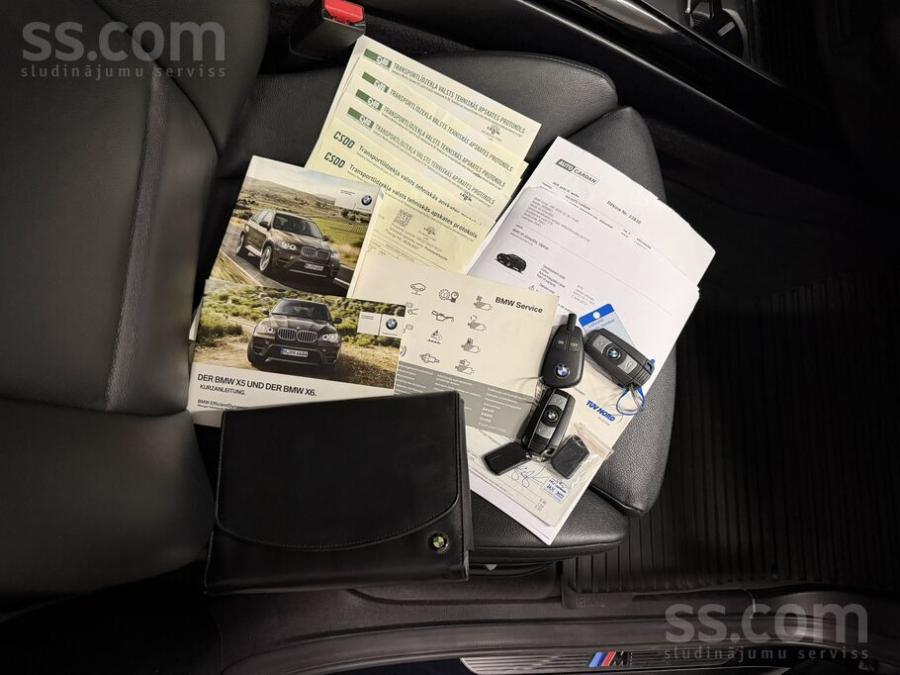 Black BMW X5 2012 in Tukums, with an engine capacity of 3.00 L and mileage of 204 thousand km for 13600 €, photo 23 on AUTOMOTO.COM.LV