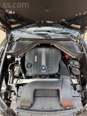 Black BMW X5 2012 in Riga, with an engine capacity of 3.00 L and mileage of 210 thousand km for 16500 €, photo 15 on AUTOMOTO.COM.LV