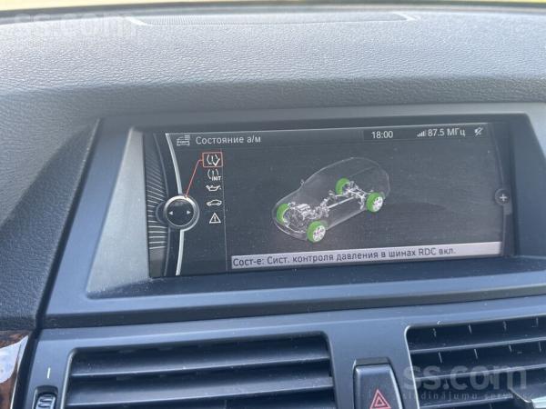 Black BMW X5 2012 in Liepaja, with an engine capacity of 3.00 L and mileage of 176 thousand km for 13000 €, photo 7 on AUTOMOTO.COM.LV