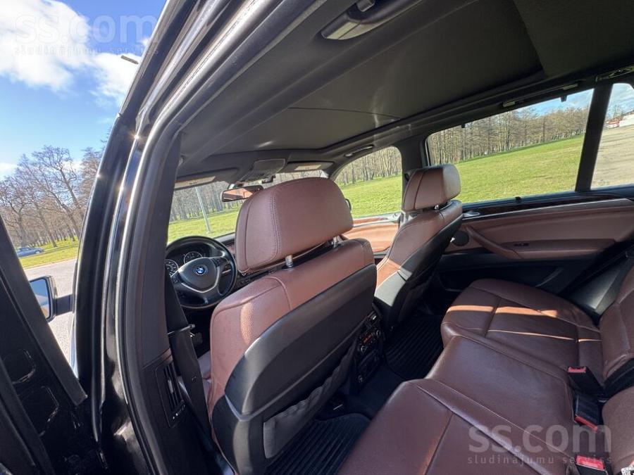 Melns BMW X5 2012 Liepāja, ar dzinēja tilpumu 3.00 L un nobraukumu 176 tūkst. km par 13000 €, foto 12 vietnē AUTOMOTO.COM.LV