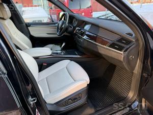 Black BMW X5 2012 in Riga, with an engine capacity of 3.00 L and mileage of 250 thousand km for 16500 €, photo 13 on AUTOMOTO.COM.LV