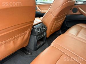 Black BMW X5 2012 in Riga, with an engine capacity of 3.00 L and mileage of 280 thousand km for 12990 €, photo 23 on AUTOMOTO.COM.LV