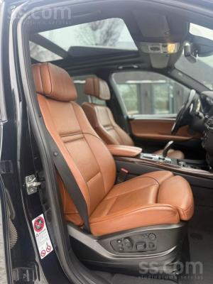 Black BMW X5 2012 in Riga, with an engine capacity of 3.00 L and mileage of 280 thousand km for 12990 €, photo 26 on AUTOMOTO.COM.LV