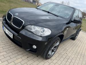 Black BMW X5 2012 in Riga, with an engine capacity of 3.00 L and mileage of 263 thousand km for 15990 €, photo 16 on AUTOMOTO.COM.LV