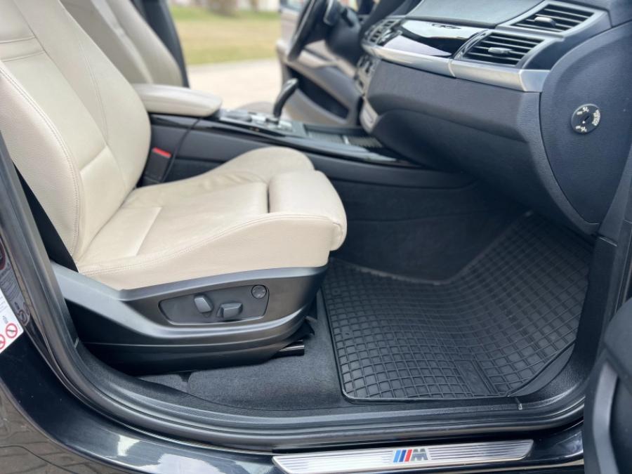 Black BMW X5 2012 in Riga, with an engine capacity of 3.00 L and mileage of 263 thousand km for 15990 €, photo 20 on AUTOMOTO.COM.LV