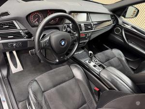 Black BMW X5 2012 in Marijampole, with an engine capacity of 2.99 L and mileage of 285 thousand km for 11700 €, photo 3 on AUTOMOTO.COM.LV