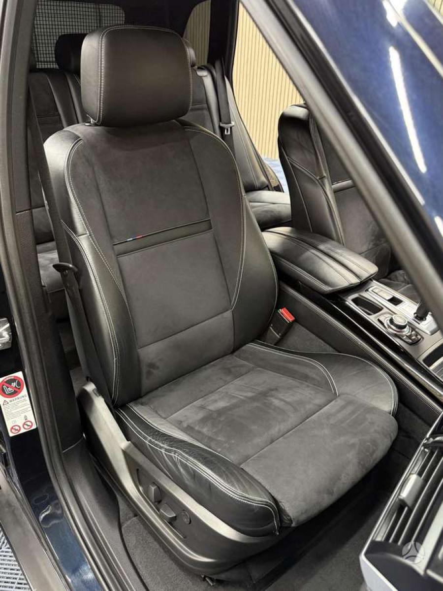 Black BMW X5 2012 in Marijampole, with an engine capacity of 2.99 L and mileage of 285 thousand km for 11700 €, photo 17 on AUTOMOTO.COM.LV