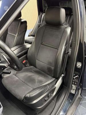 Black BMW X5 2012 in Marijampole, with an engine capacity of 2.99 L and mileage of 285 thousand km for 11700 €, photo 20 on AUTOMOTO.COM.LV