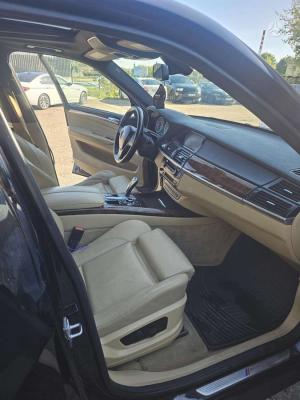 Black BMW X5 2012 in Klaipeda, with an engine capacity of 4.40 L and mileage of 180 thousand km for 8500 €, photo 14 on AUTOMOTO.COM.LV