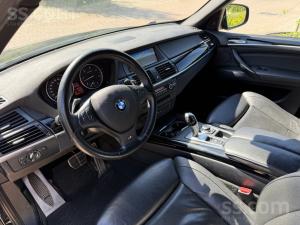 Black BMW X5 2012 in Riga, with an engine capacity of 3.00 L and mileage of 234 thousand km for 12300 €, photo 7 on AUTOMOTO.COM.LV