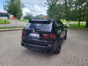Black BMW X5 2012 in Siauliai, with an engine capacity of 4.40 L and mileage of 208 thousand km for 12500 €, photo 11 on AUTOMOTO.COM.LV