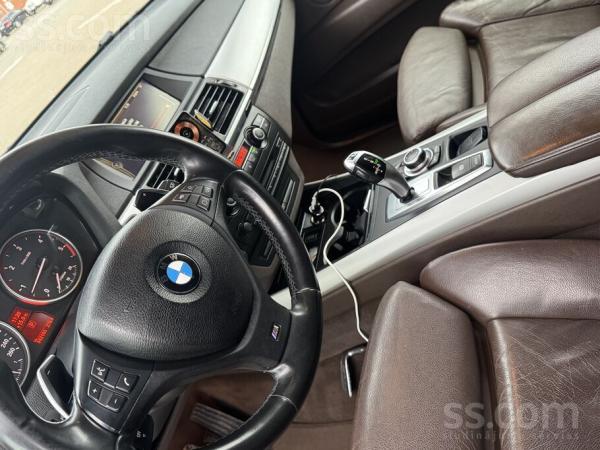 Melns BMW X5 2012 Valmiera, ar dzinēja tilpumu 3.00 L un nobraukumu 340 tūkst. km par 10900 €, foto 5 vietnē AUTOMOTO.COM.LV