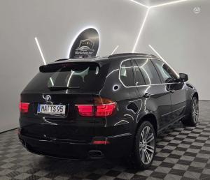 Black BMW X5 2013 in Marijampole, with an engine capacity of 2.99 L and mileage of 226 thousand km for 12999 €, photo 29 on AUTOMOTO.COM.LV