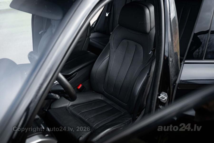 Black BMW X5 2013 in Tallinn, with an engine capacity of 3.00 L and mileage of 292 thousand km for 17990 €, photo 14 on AUTOMOTO.COM.LV