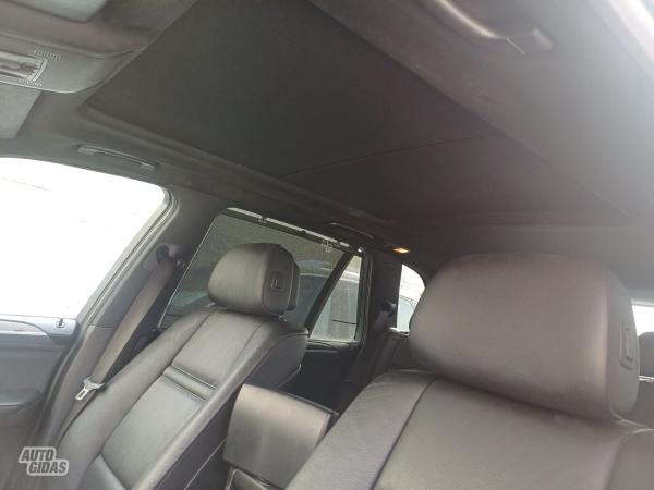 Black BMW X5 2013 in Kretinga, with an engine capacity of 3.00 L and mileage of 185 thousand km for 9600 €, photo 7 on AUTOMOTO.COM.LV