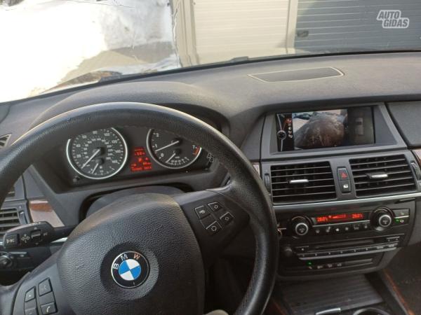 Black BMW X5 2013 in Kretinga, with an engine capacity of 3.00 L and mileage of 185 thousand km for 9600 €, photo 9 on AUTOMOTO.COM.LV
