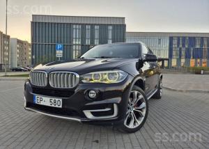 Black BMW X5 2013 in Riga, with an engine capacity of 3.00 L and mileage of 271 thousand km for 22900 €, photo  on AUTOMOTO.COM.LV