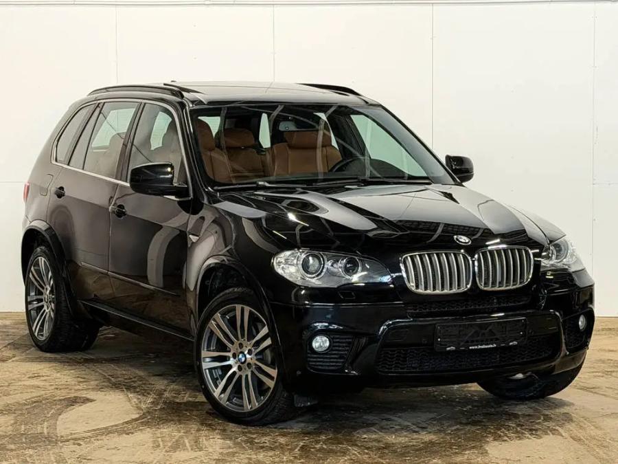 Black BMW X5 2013 in Jurmala, with an engine capacity of 3.00 L and mileage of 284 thousand km for 15695 €, photo 4 on AUTOMOTO.COM.LV