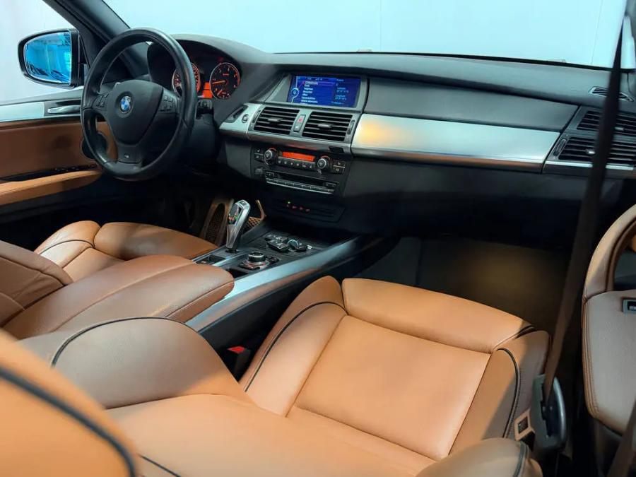Black BMW X5 2013 in Jurmala, with an engine capacity of 3.00 L and mileage of 284 thousand km for 15695 €, photo 20 on AUTOMOTO.COM.LV