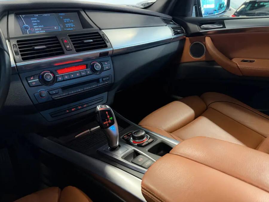Black BMW X5 2013 in Jurmala, with an engine capacity of 3.00 L and mileage of 284 thousand km for 15695 €, photo 25 on AUTOMOTO.COM.LV