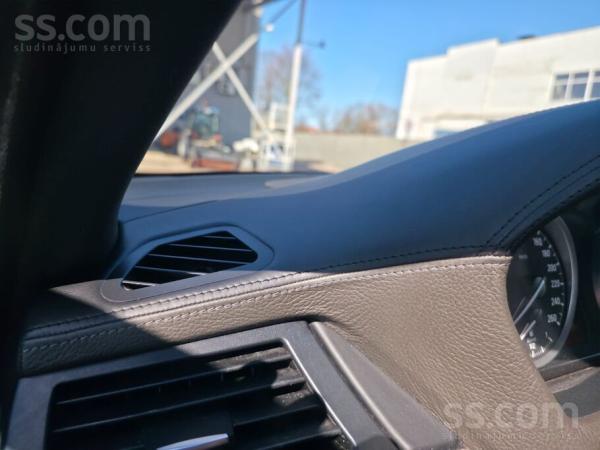 Black BMW X5 2013 in Riga, with an engine capacity of 3.00 L and mileage of 201 thousand km for 16000 €, photo 4 on AUTOMOTO.COM.LV