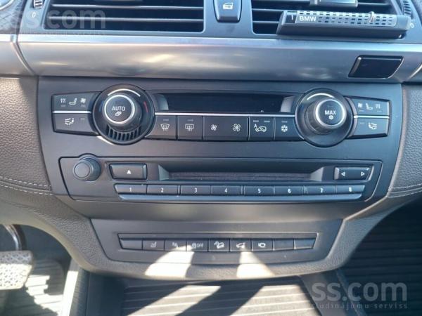 Black BMW X5 2013 in Riga, with an engine capacity of 3.00 L and mileage of 201 thousand km for 16000 €, photo 6 on AUTOMOTO.COM.LV