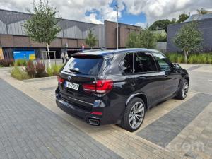 Black BMW X5 2013 in Riga, with an engine capacity of 3.00 L and mileage of 236 thousand km for 23000 €, photo 6 on AUTOMOTO.COM.LV