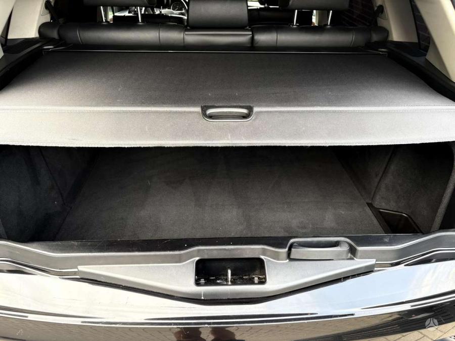 Black BMW X5 2013 in Kaunas, with an engine capacity of 2.99 L and mileage of 170 thousand km for 14990 €, photo 19 on AUTOMOTO.COM.LV