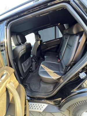 Black BMW X5 2013 in Raseiniai, with an engine capacity of 2.99 L and mileage of 232 thousand km for 14350 €, photo 4 on AUTOMOTO.COM.LV
