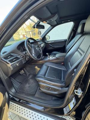Black BMW X5 2013 in Raseiniai, with an engine capacity of 2.99 L and mileage of 232 thousand km for 14350 €, photo 5 on AUTOMOTO.COM.LV